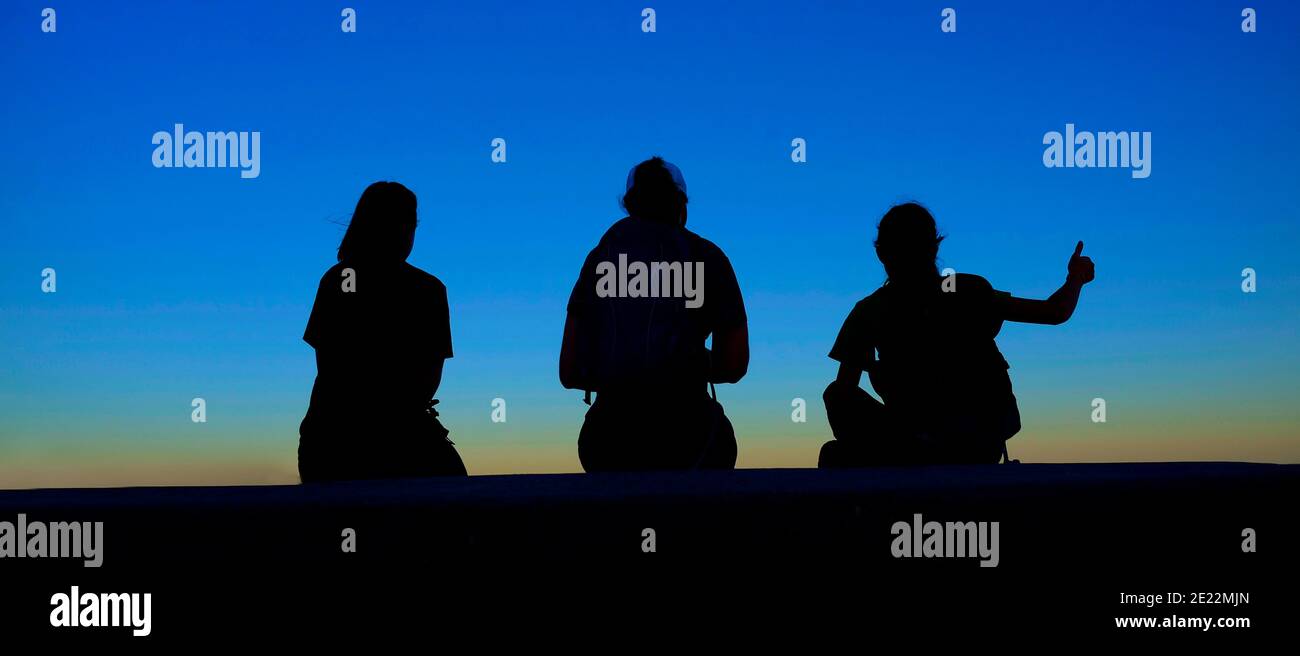 Family together outdoors sunrise hi-res stock photography and images ...