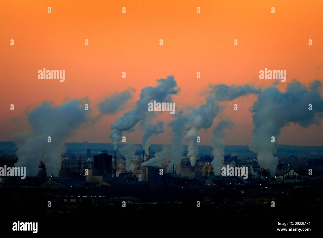 Factory silhouette pollution smokestacks hi-res stock photography and ...