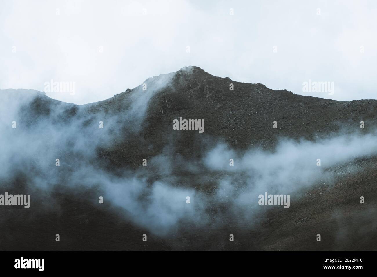 Storm Clouds On The Top Of Mountain Stock Photo - Alamy