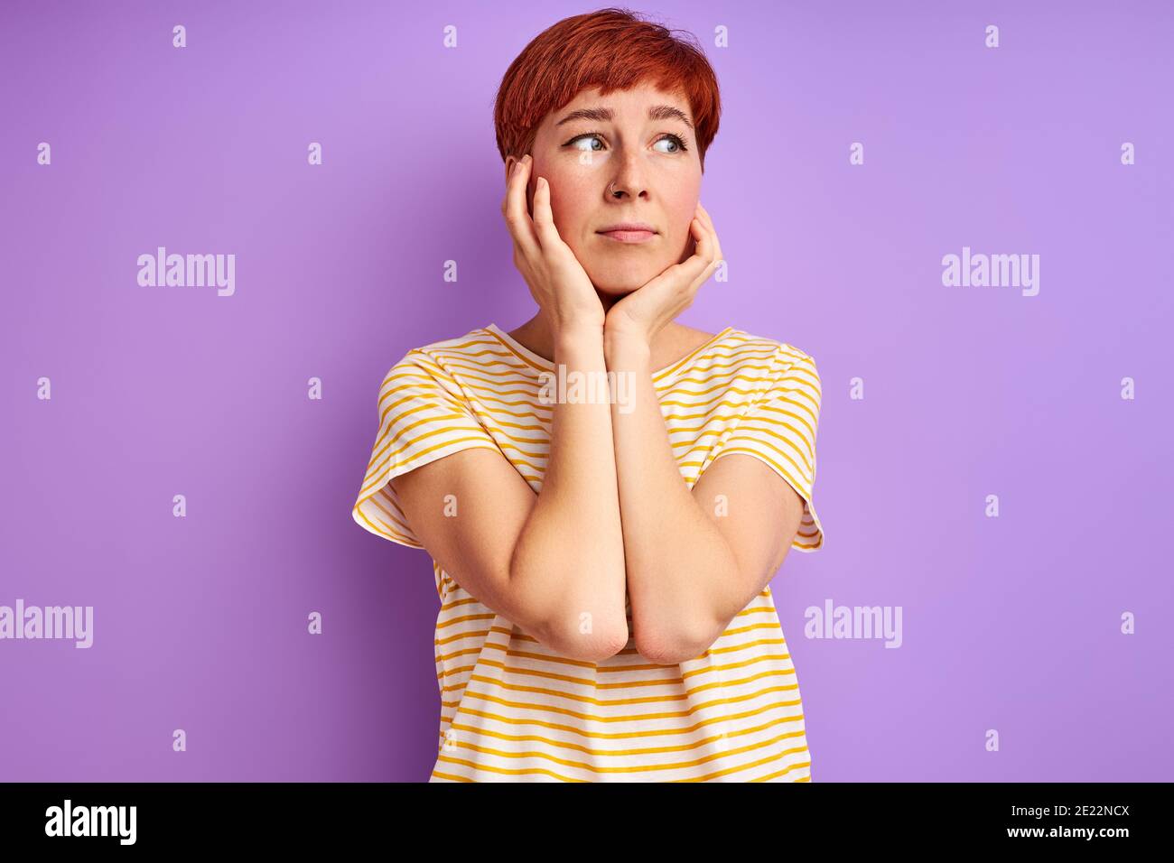 melancholy woman stand feeling sad emotions touching face and lookin at ...