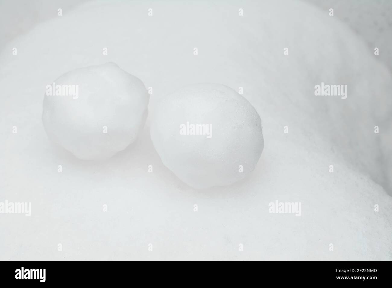 A bunch of Snowballs in snow Stock Photo - Alamy