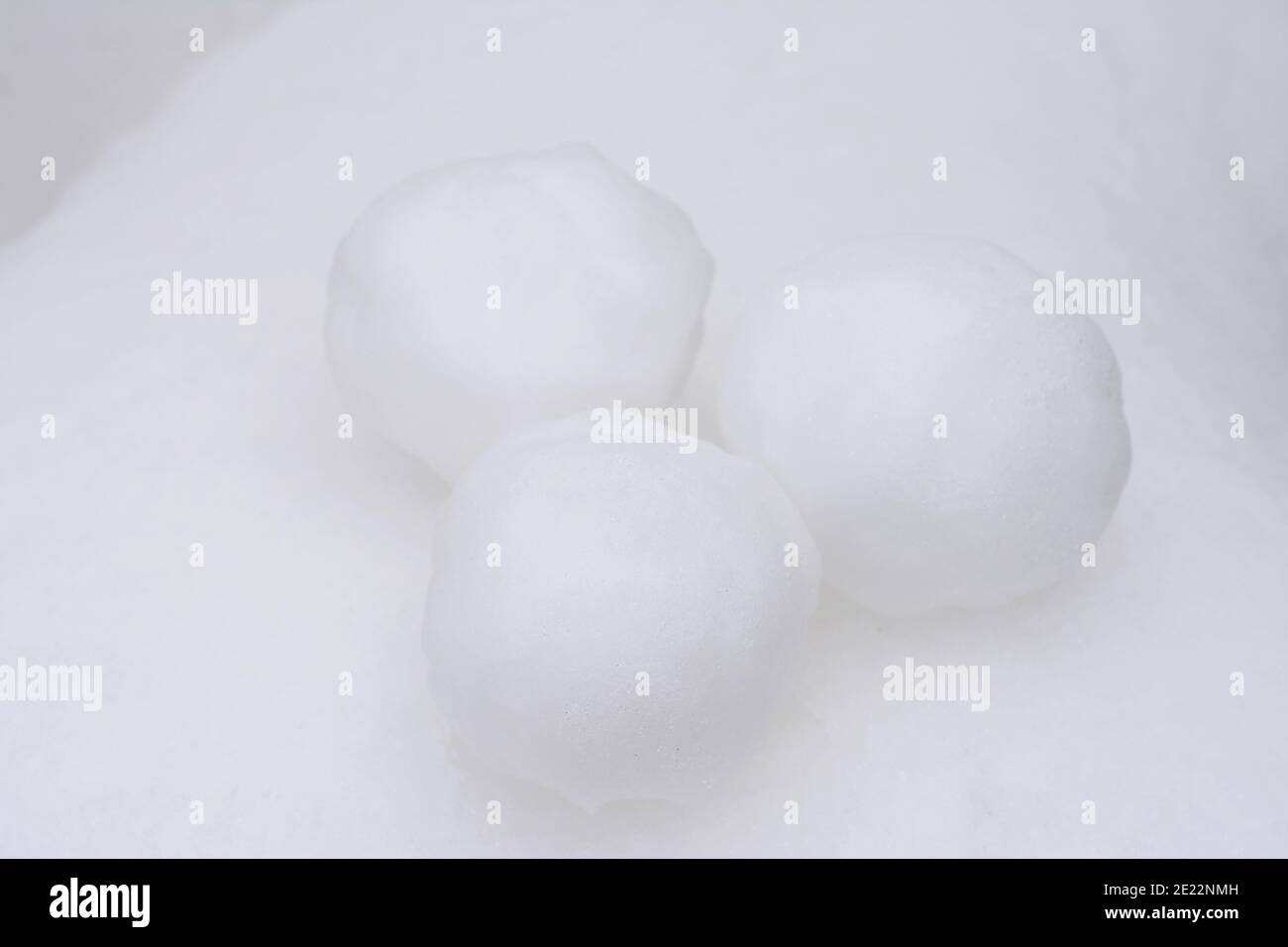 A bunch of Snowballs in snow Stock Photo - Alamy