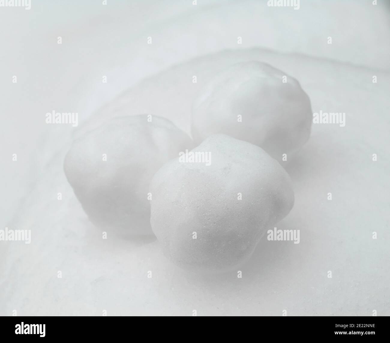 A bunch of Snowballs in snow Stock Photo - Alamy