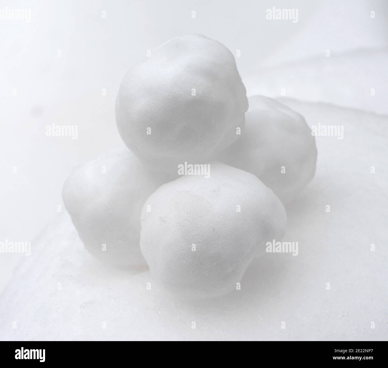 A bunch of Snowballs in snow Stock Photo - Alamy