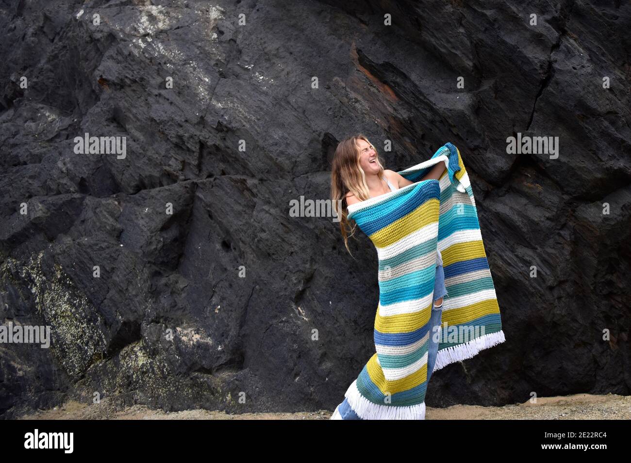 Girl on a beach in Cornwall Stock Photo - Alamy