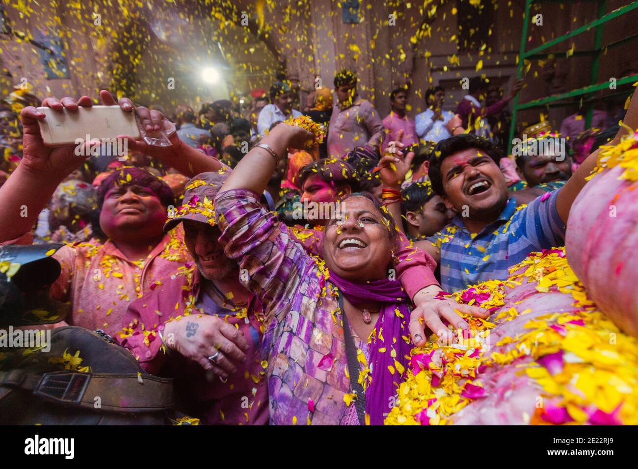Devotees celebrate Phoolon Wali Holi, a holi with flower petals held at ...