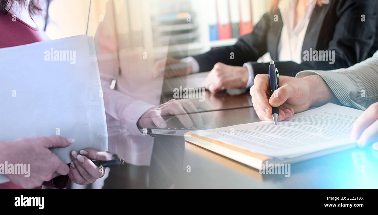 Business people taking notes during a training; multiple exposure Stock ...