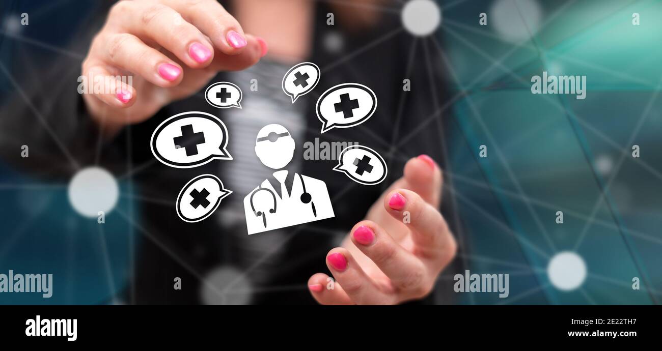 Medical assistance concept between hands of a woman in background Stock ...