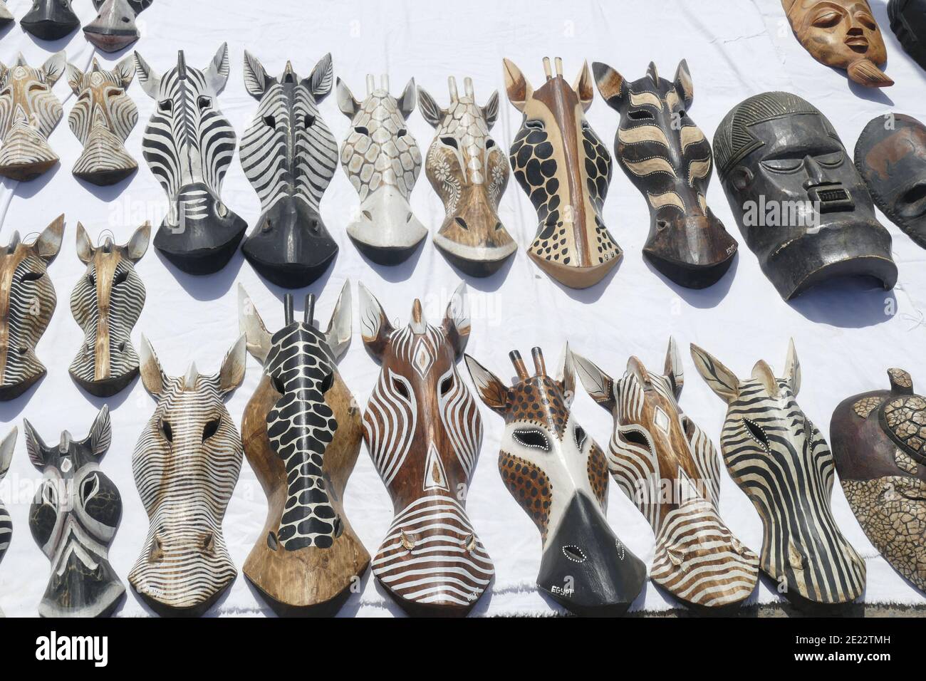 Animal masks hanging from a white wall in Awan Egypt Stock Photo - Alamy