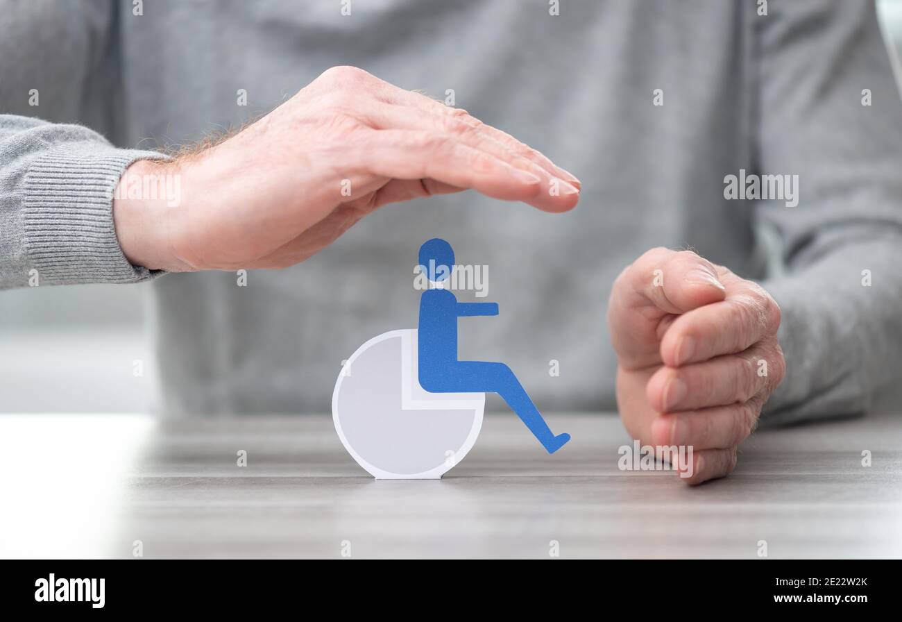 Disabled person protected by hands - Concept of disability insurance ...