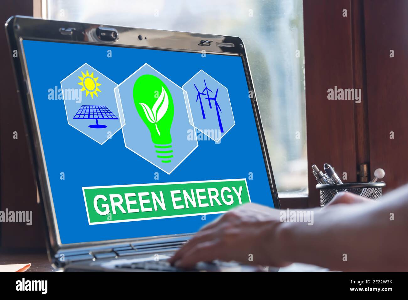 Laptop screen displaying a green energy concept Stock Photo - Alamy