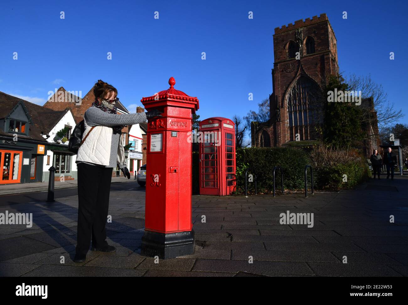 Woman Posting Letter In Post High Resolution Stock Photography and ...