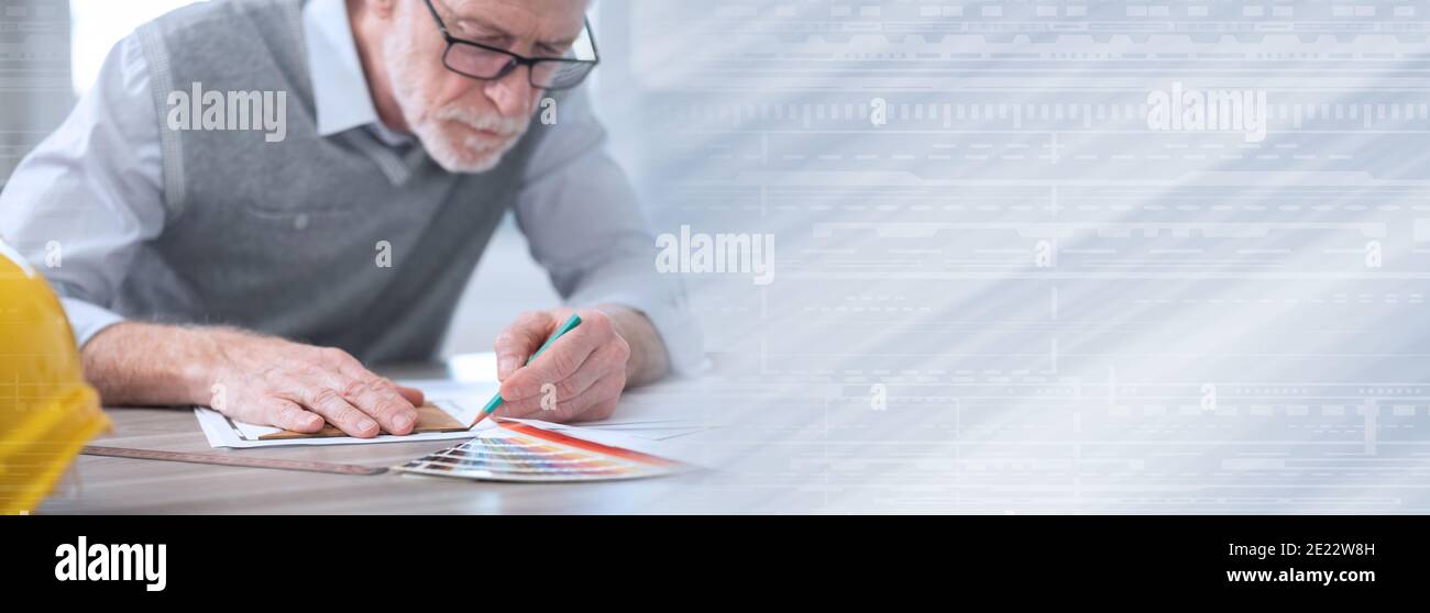 Architect working on a project and using a square; panoramic banner ...