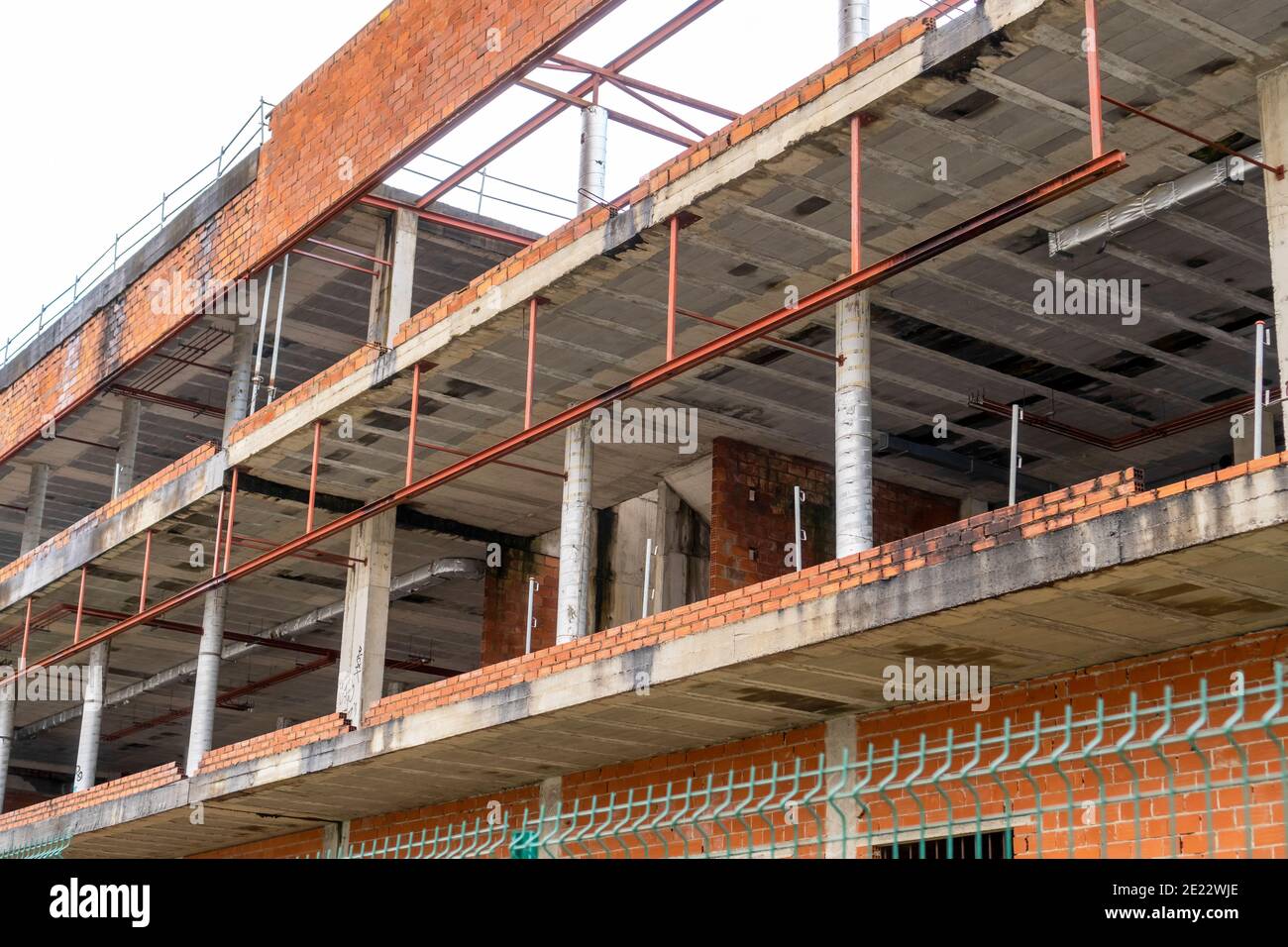 Abandoned industrial building with rusty metal structures and weathered ...