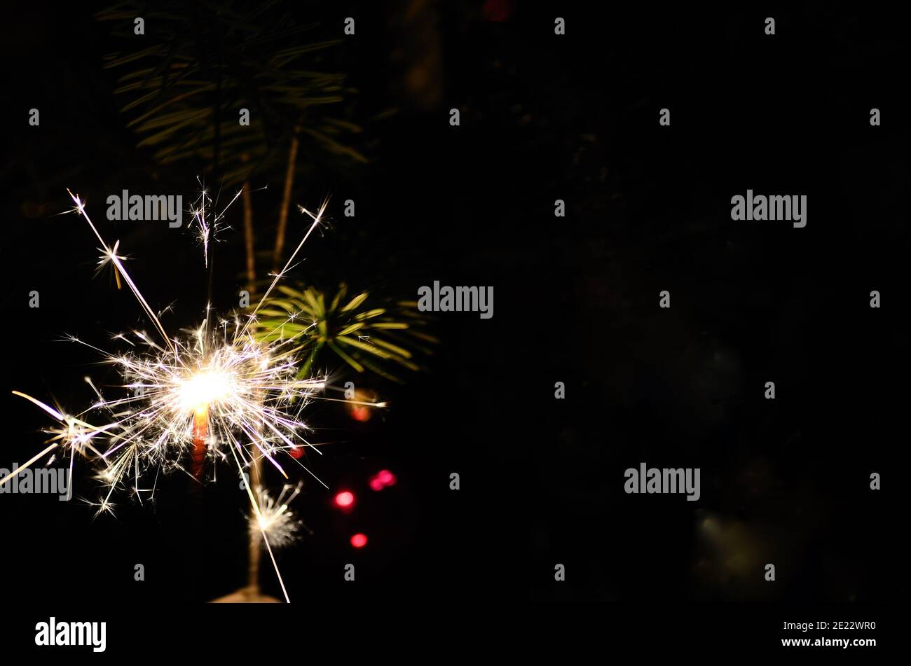 Sparkler burning in dark hi-res stock photography and images - Alamy
