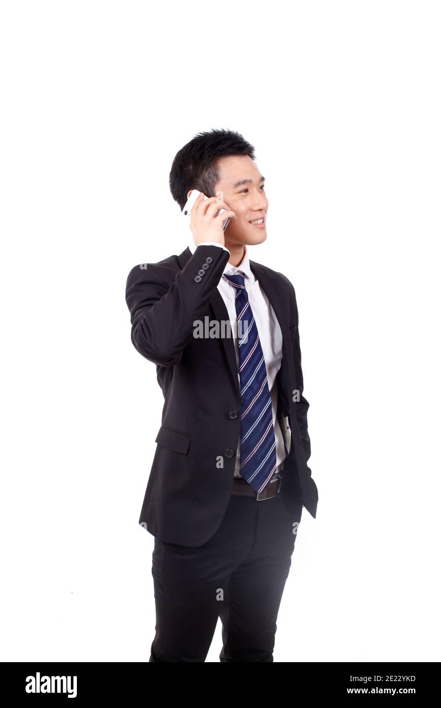 Portrait of a businessman standing with cellular phono high quality ...