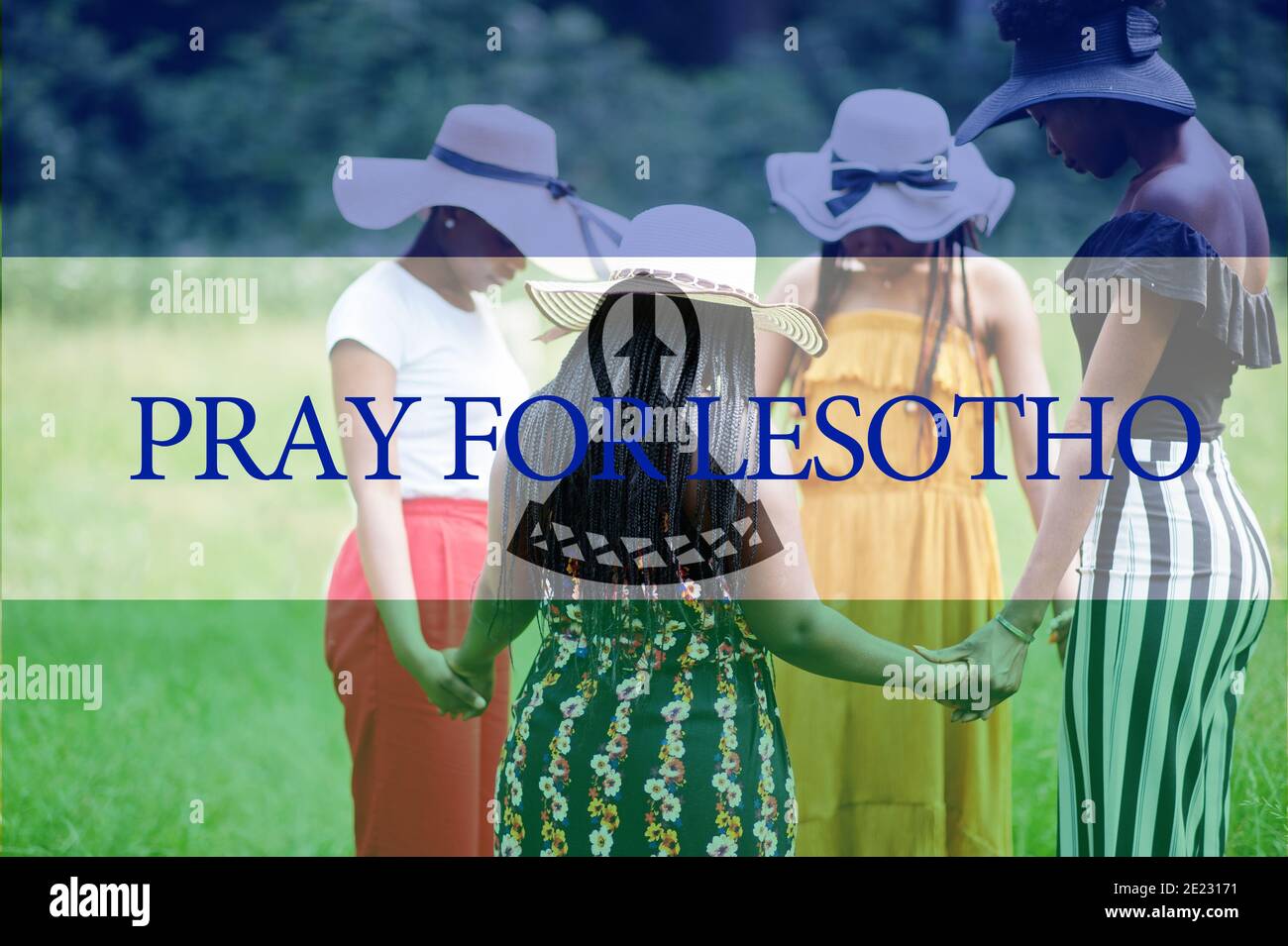 Pray for Lesotho. Group of four african women holding hands and praying ...