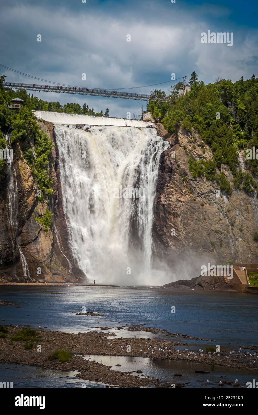 The Montmorency Falls, a large waterfall on the Montmorency River in ...