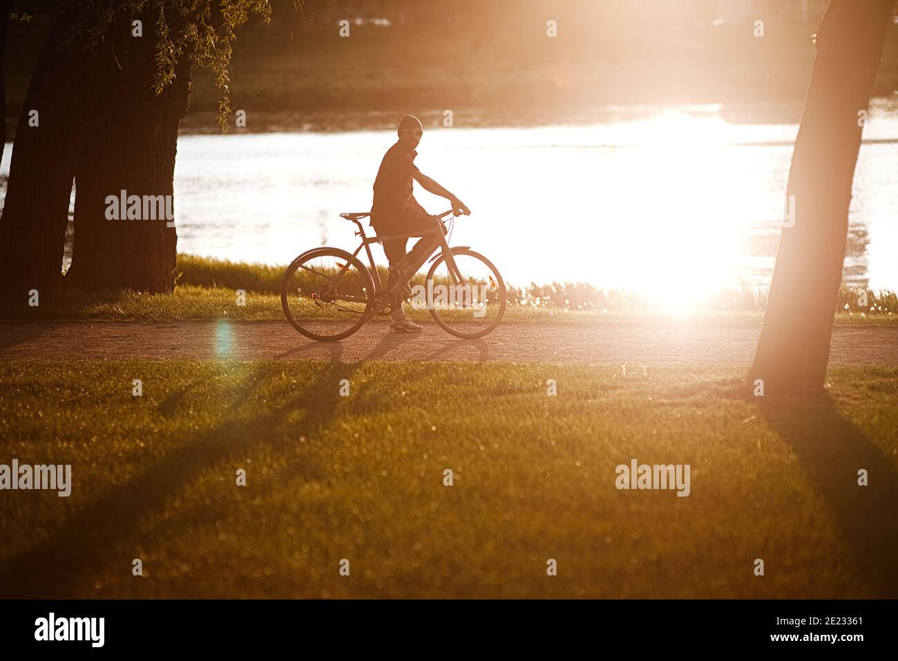 Free traveler travels bicycle sunset hi-res stock photography and ...