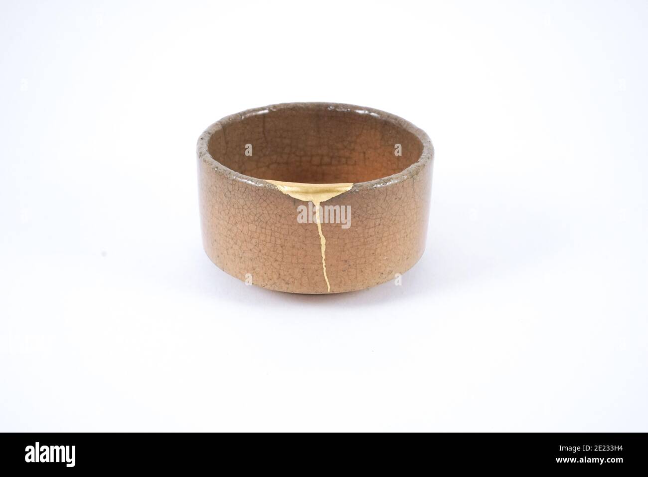 Beige Kintsugi Japanese sake cups isolated Stock Photo - Alamy