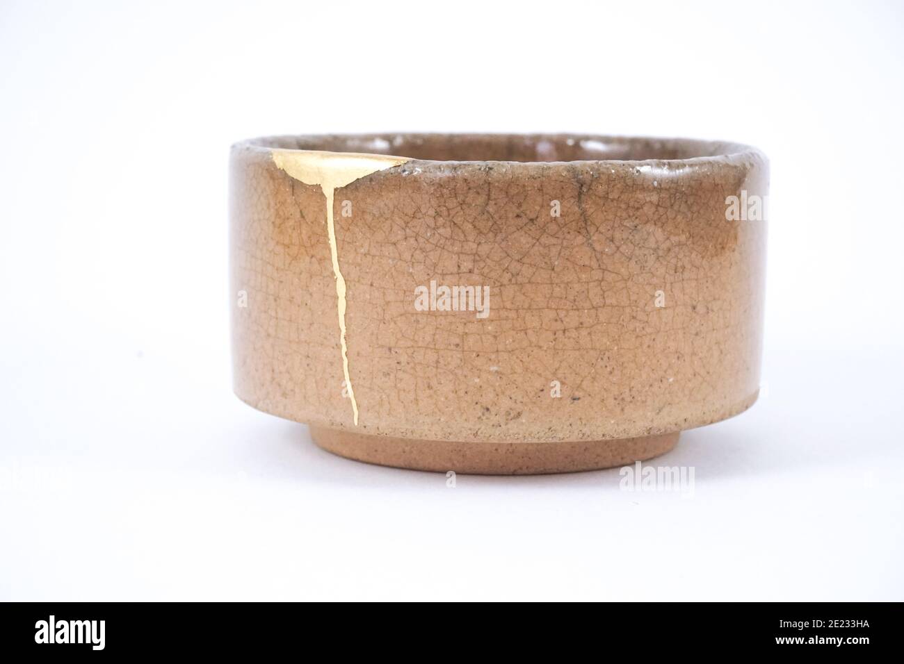 Beige Kintsugi Japanese sake cups isolated Stock Photo - Alamy