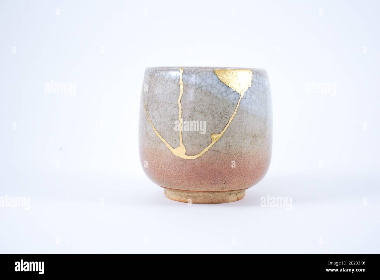 Beige Kintsugi Japanese sake cups isolated Stock Photo - Alamy