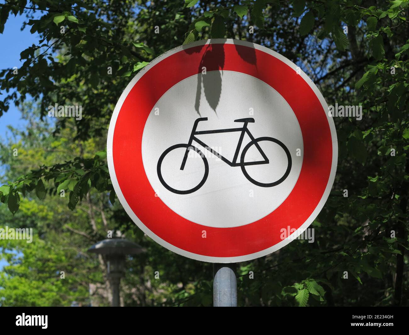 Traffic sign bicycles in the street forbidden Stock Photo - Alamy