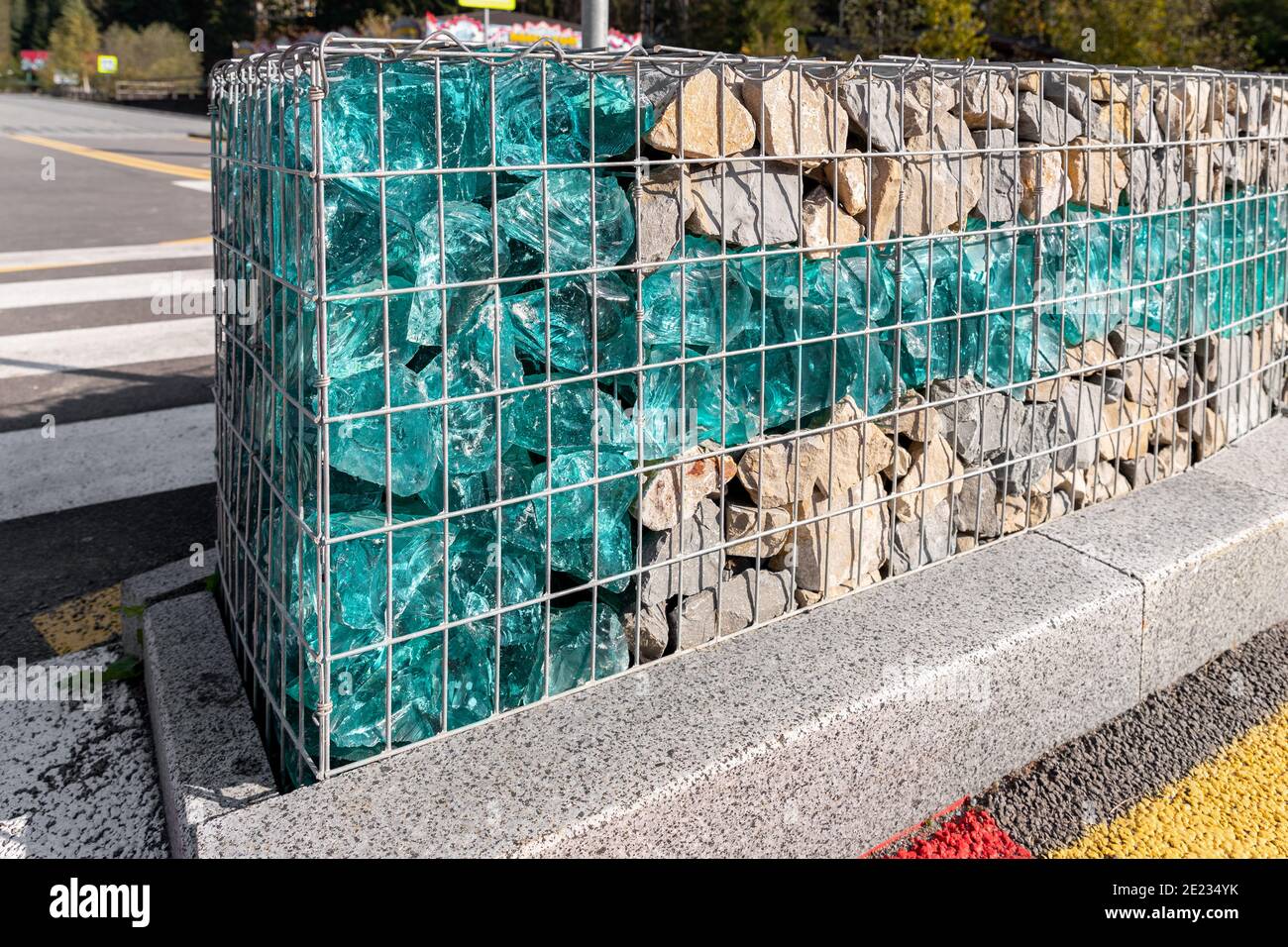 Close-up detail of new modern beautiful gabion fence with metal cage ...