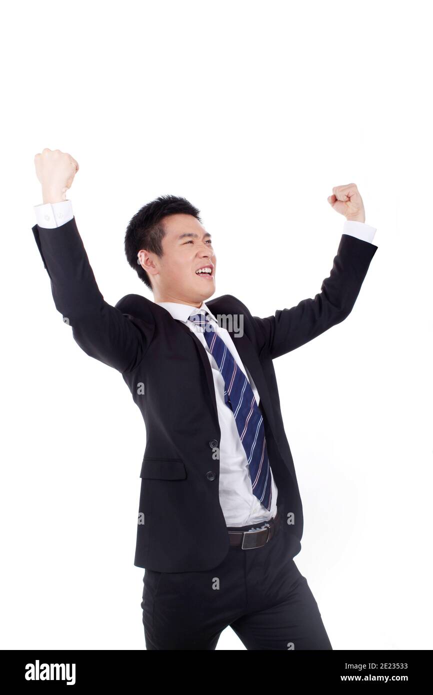 Businessman excited about his success in front of white background high ...