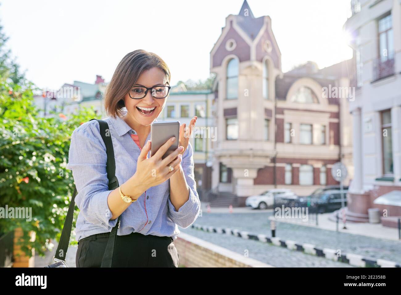 Businesswoman smartphone talking video call hi-res stock photography ...