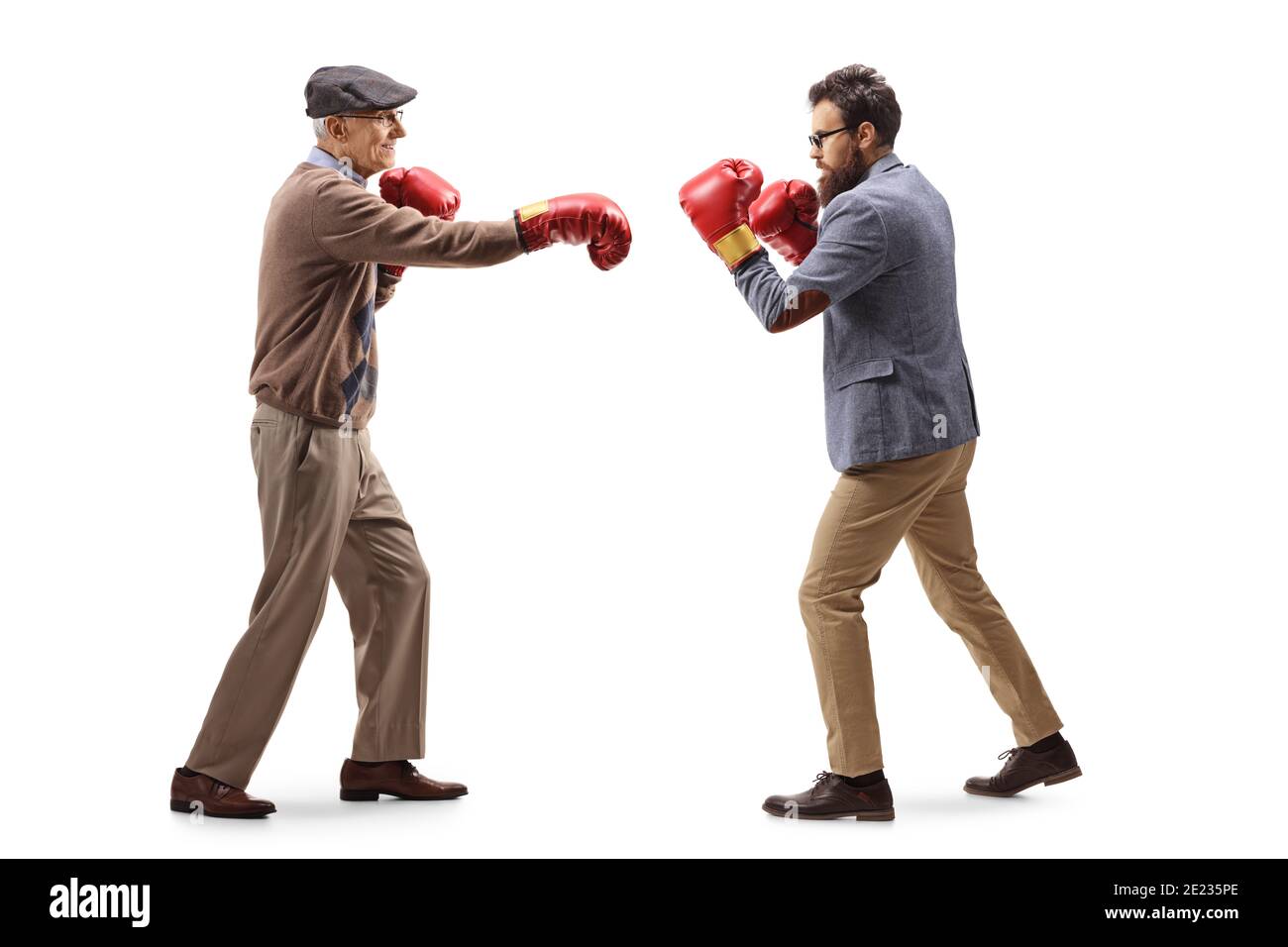 Elderly father and son fighting with boxing gloves isolated on white ...