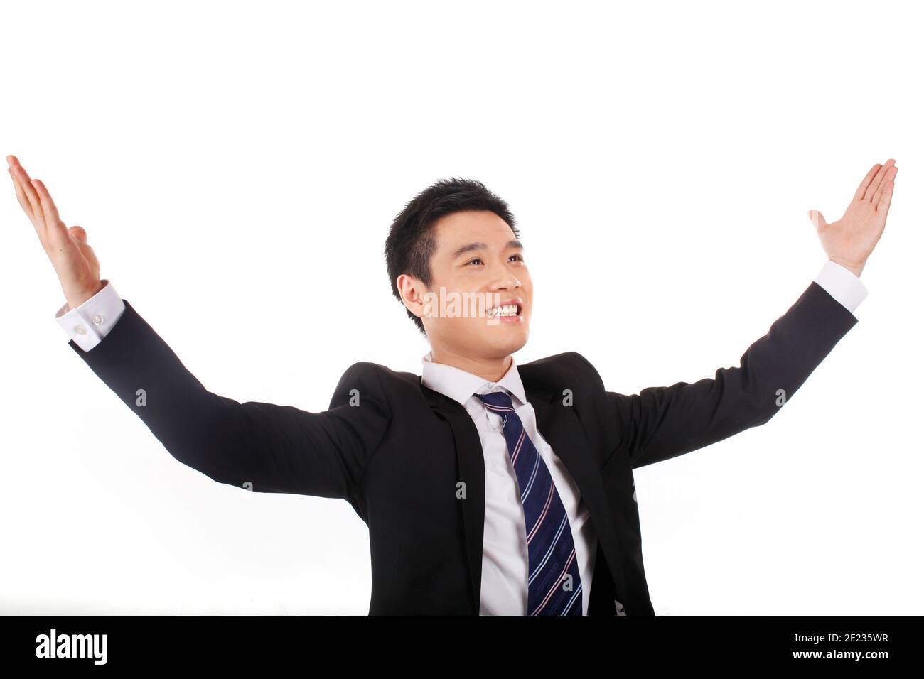 Businessman excited about his success in front of white background high ...