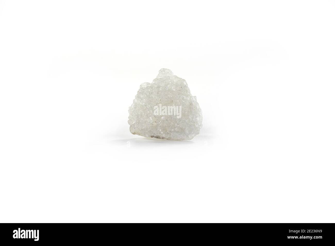 Block of rock salt mineral isolated on white background Stock Photo - Alamy