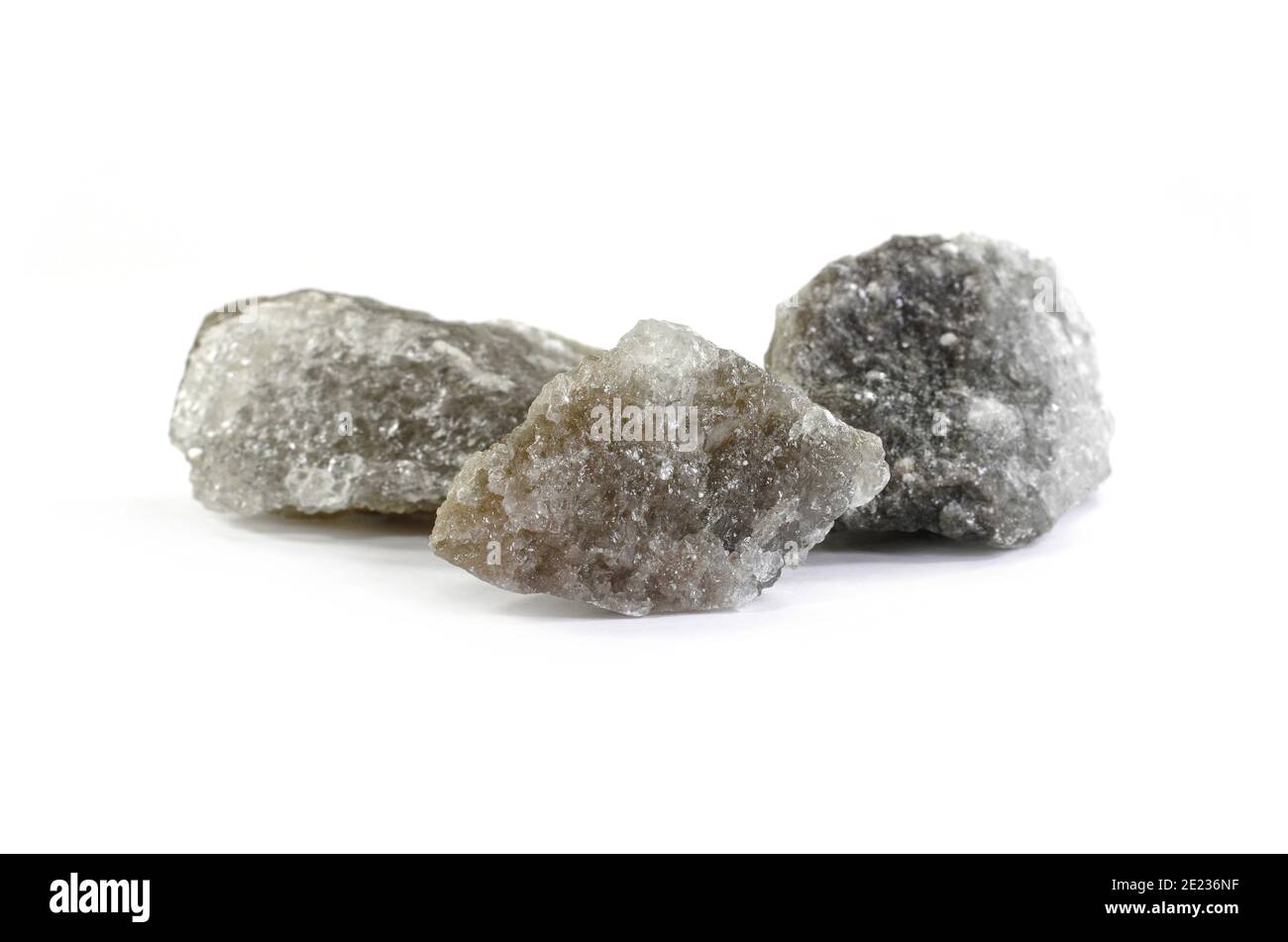 Block of rock salt mineral isolated on white background Stock Photo - Alamy