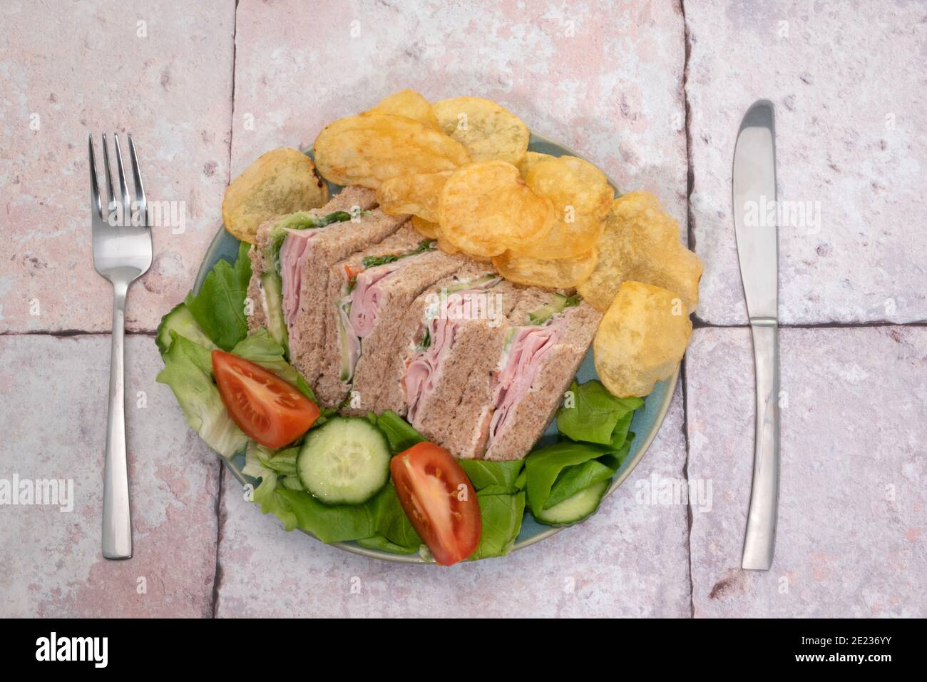 Ham sandwich with crisps and salad on a plate Stock Photo - Alamy