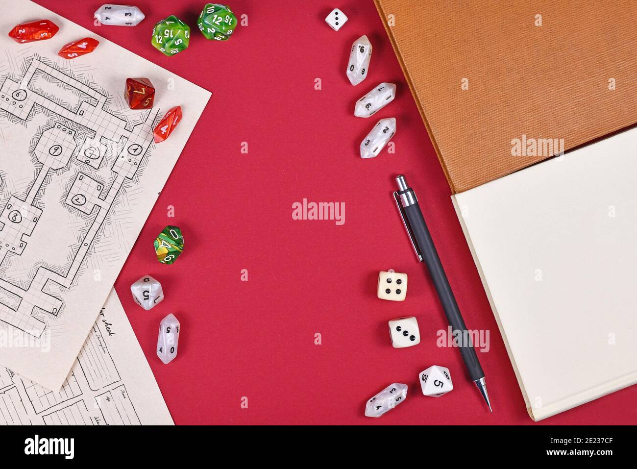 Tabletop role playing flat lay with RPG game dices, hand drawn dungeon ...