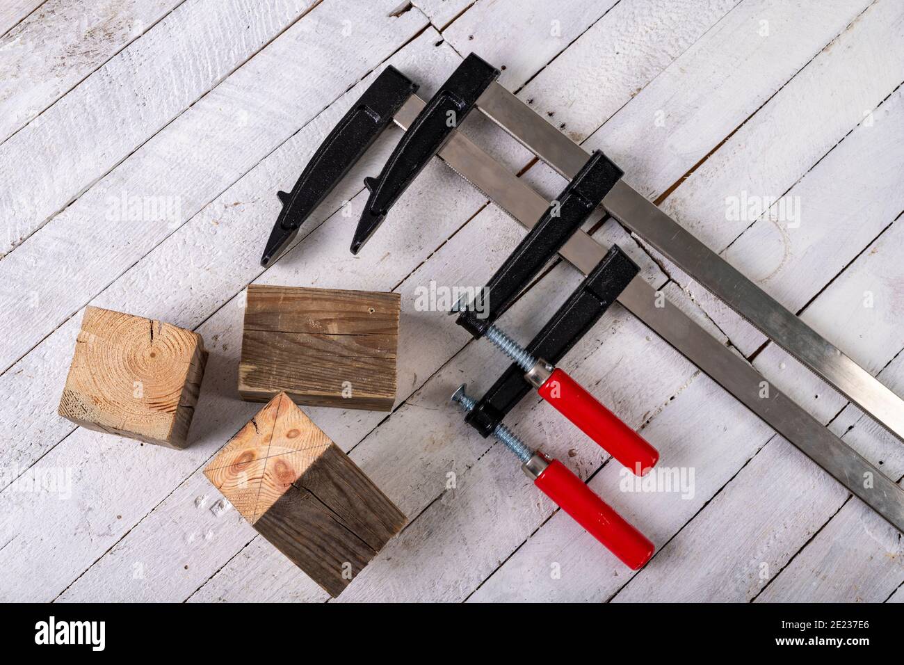 Joiner clamp for gluing wood. Carpentry accessories in the workshop ...