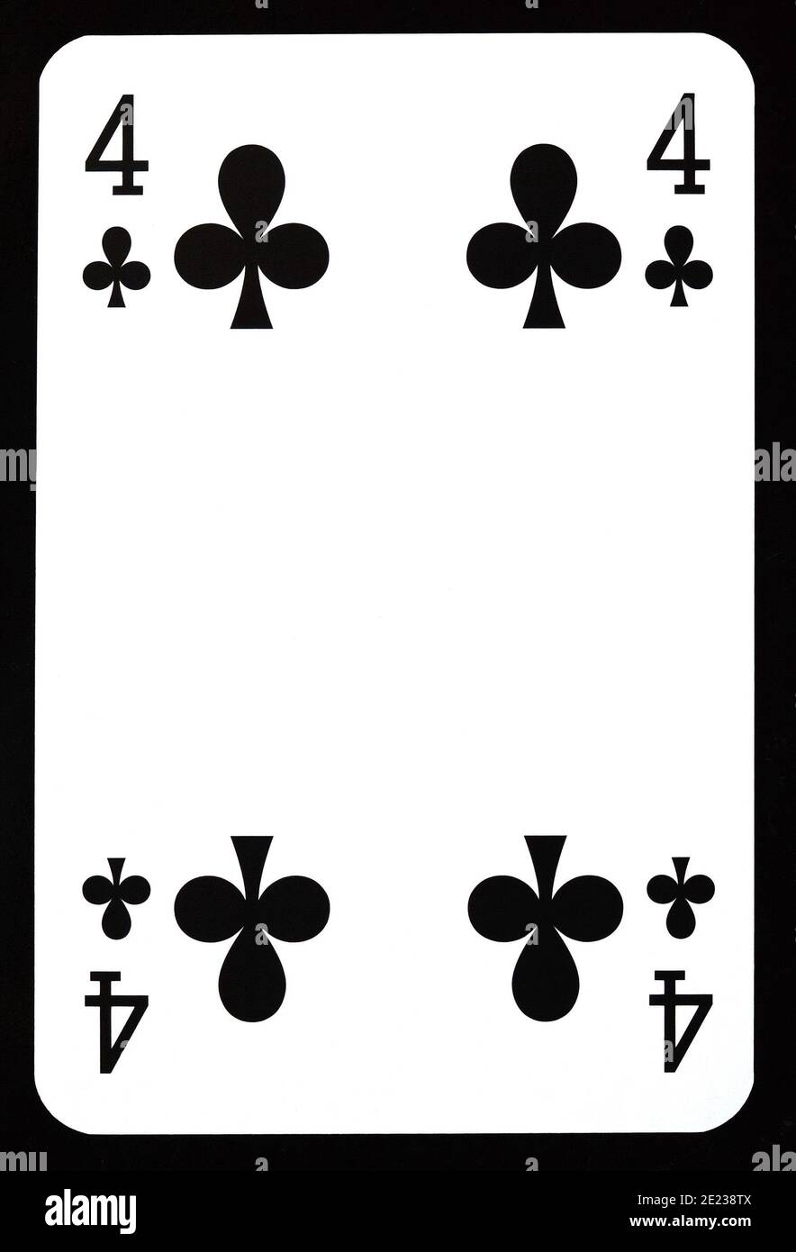 Four of clubs playing card isolated on black Stock Photo - Alamy