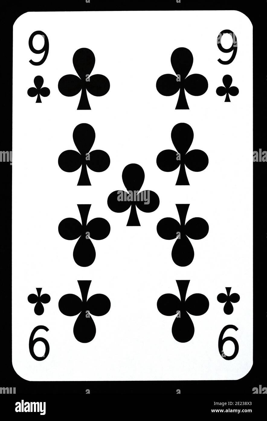 Nine of clubs playing card isolated on black Stock Photo - Alamy