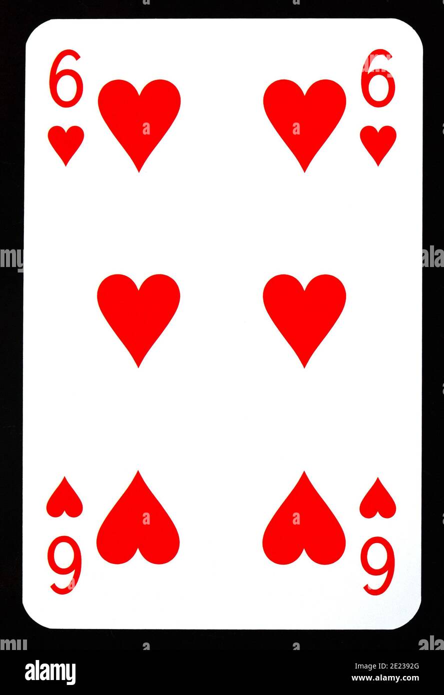 Six of hearts playing card isolated on black Stock Photo - Alamy