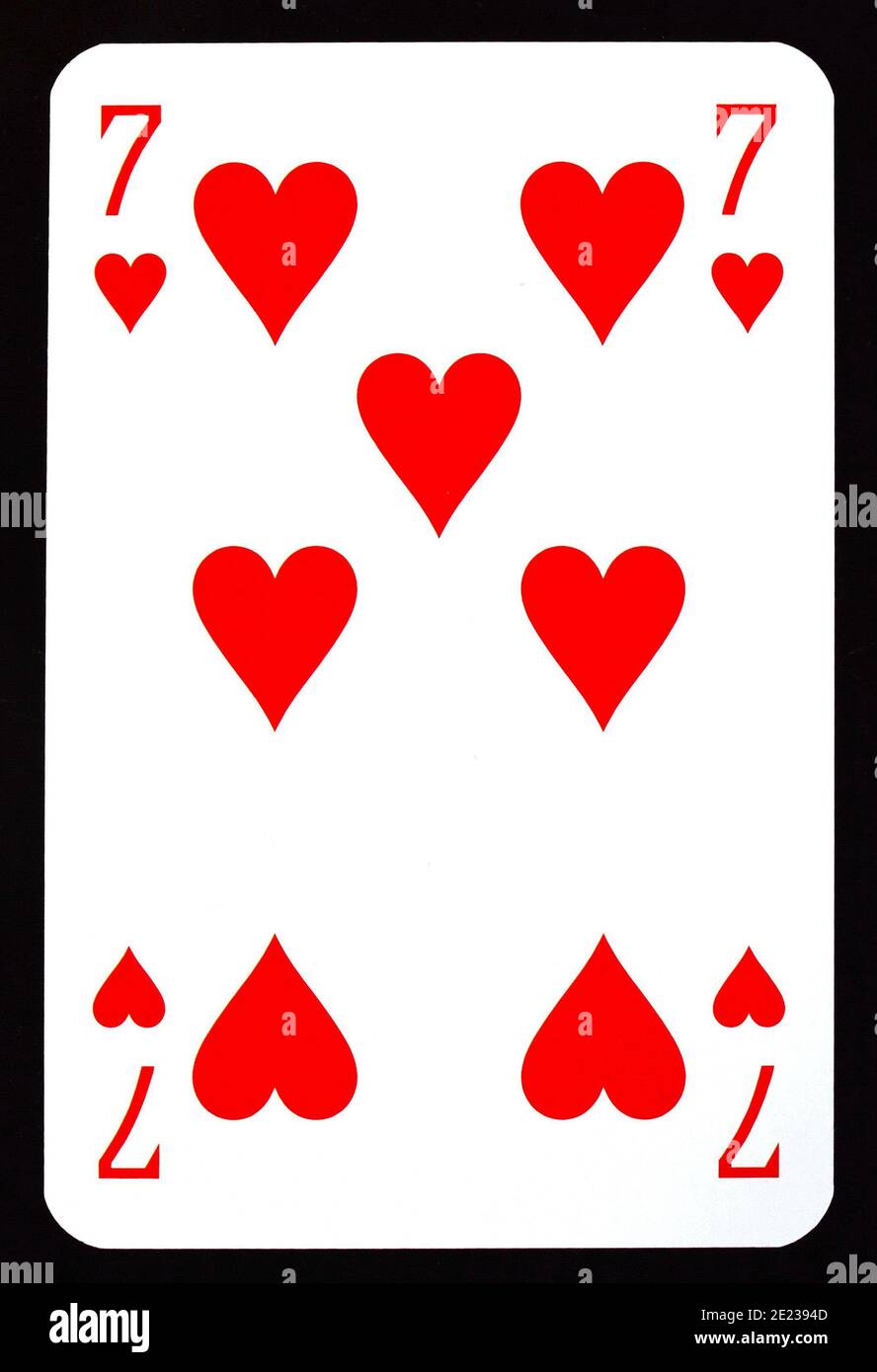 Seven of hearts playing card isolated on black Stock Photo - Alamy