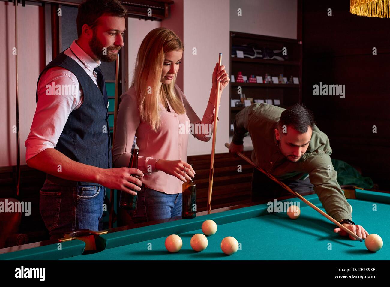 Young man bending over table hi-res stock photography and images - Alamy