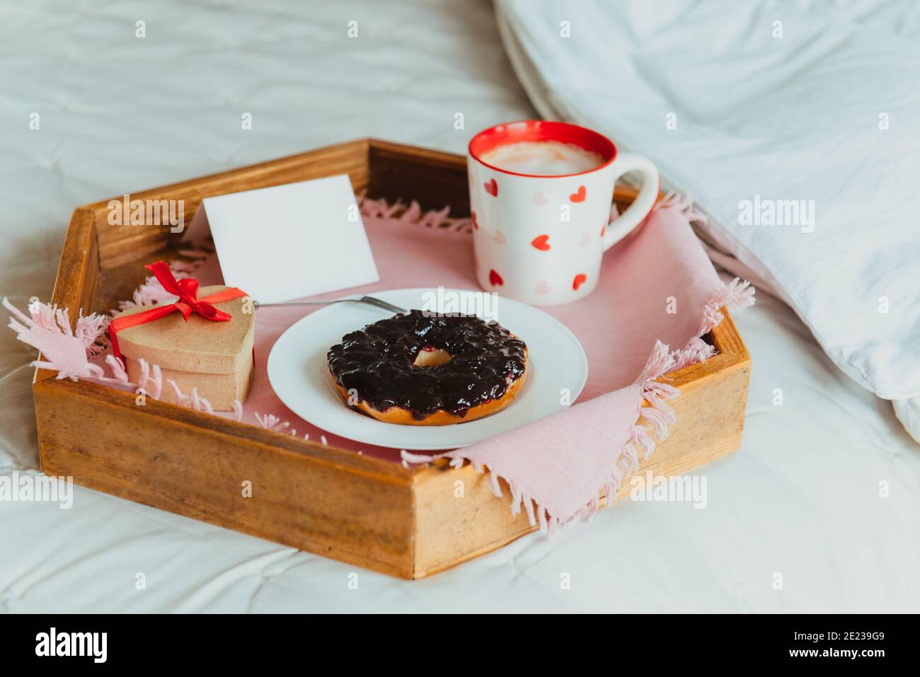 Simple Valentine's day breakfast in bed for Lover. A cup of coffee and ...