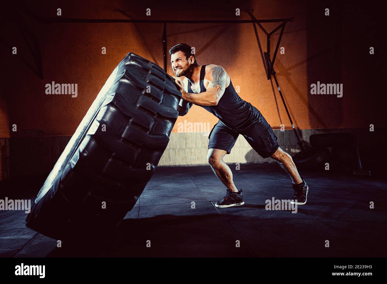 Bodybuilding training, bearded strong sportsman with muscular body ...