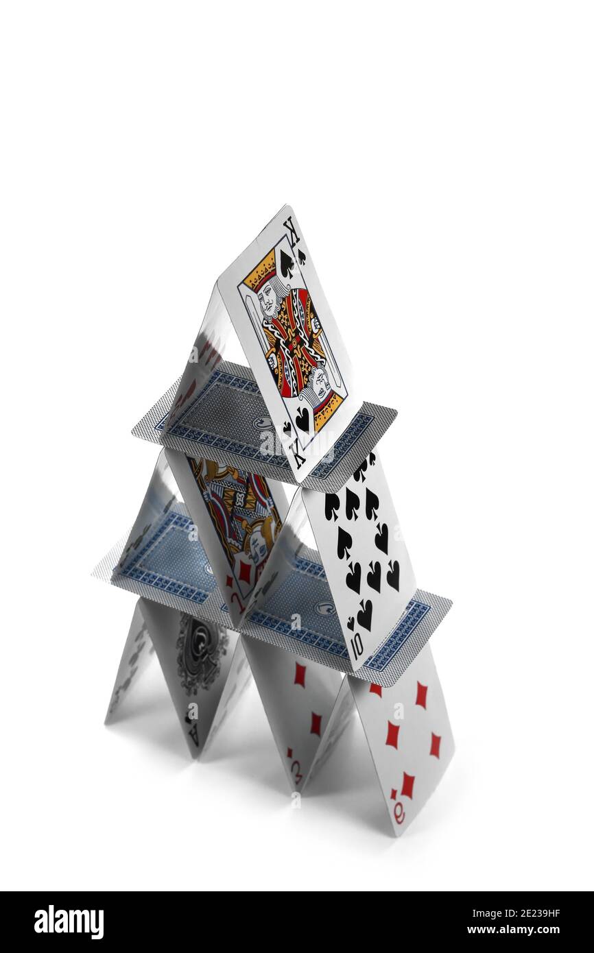 House of playing card isolated on white background Stock Photo - Alamy