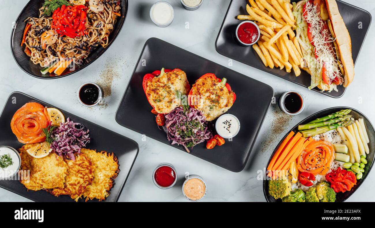 High angle shot of plates of colorful and traditional Japanese food on ...