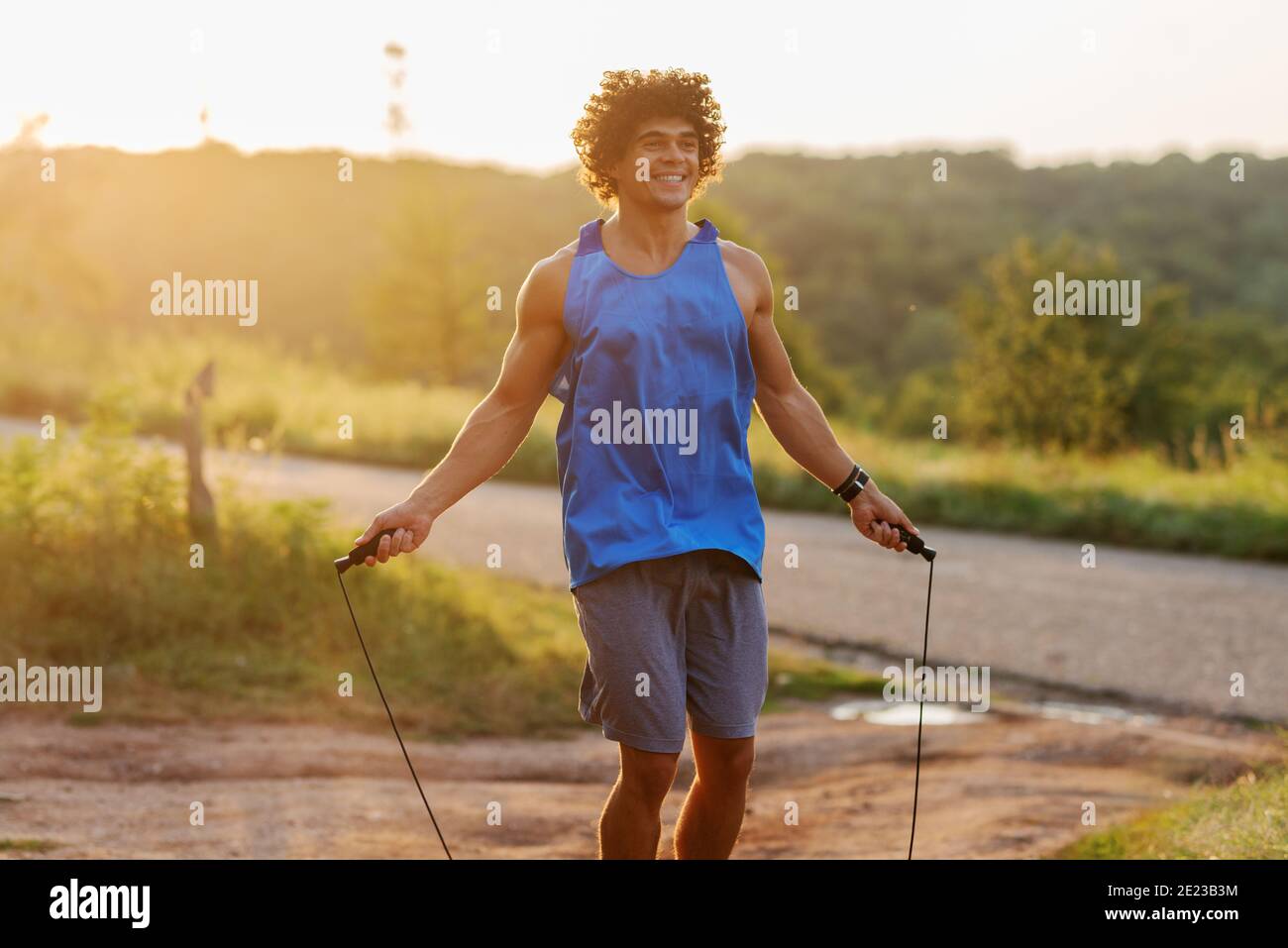 Strong man jumping rope in hi-res stock photography and images - Alamy