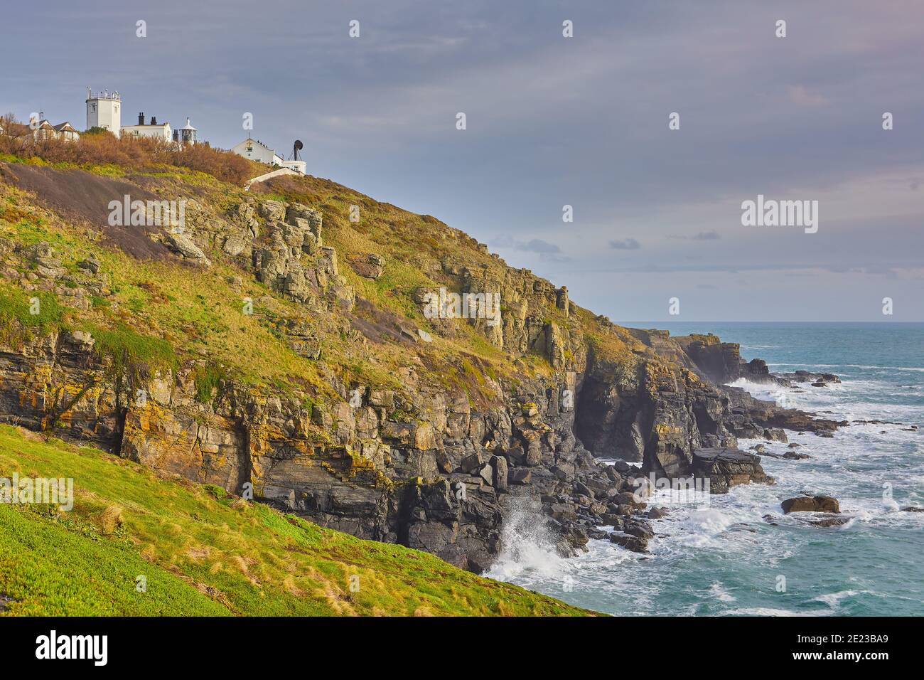 Image of the Lizard Point Lighthouse, with the headland, cliffs, sea ...