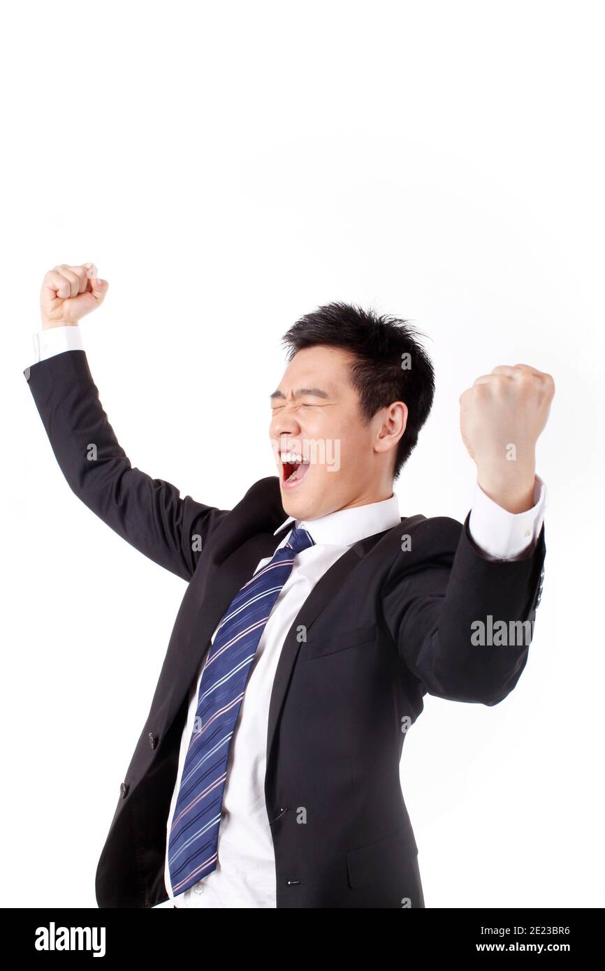 Businessman excited about his success in front of white background high ...