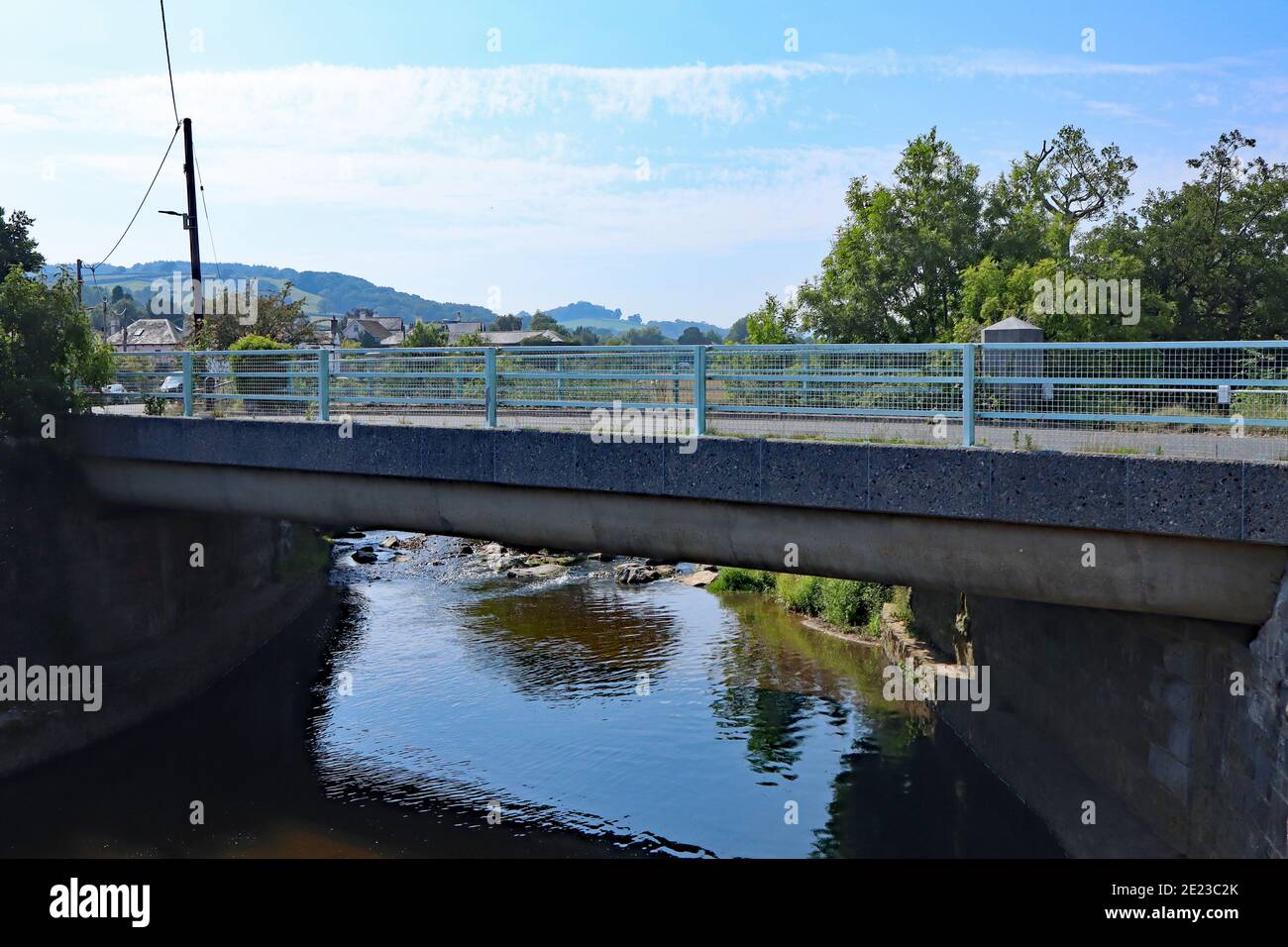 The concrete road bridge crosses the river Coly at the edge of Colyton ...